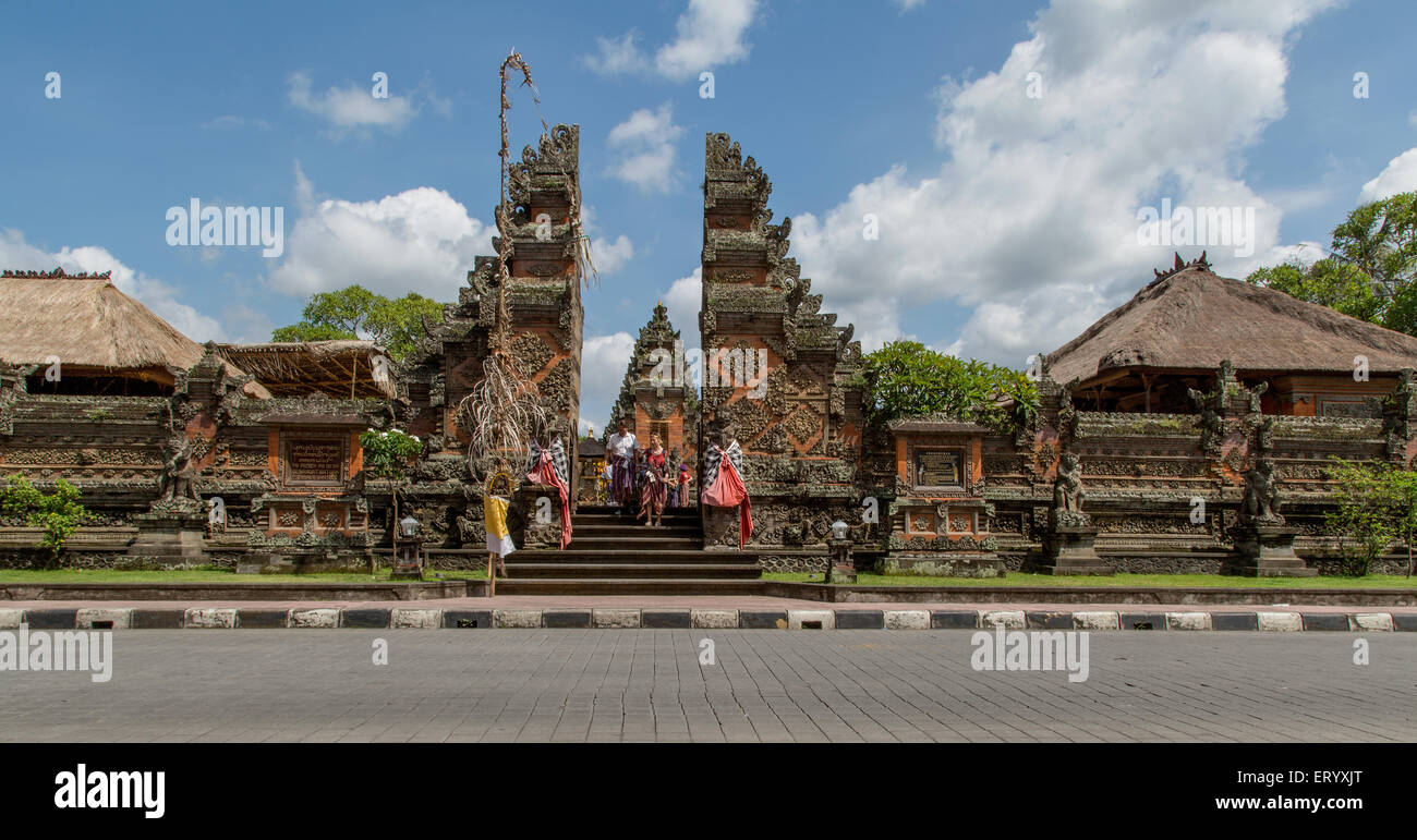 People walking out of a temple Stock Photo - Alamy
