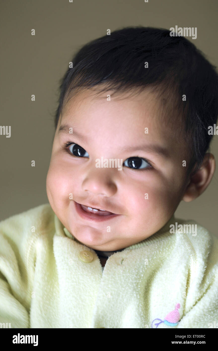 Baby boy stubborn expression MR#732 Stock Photo - Alamy