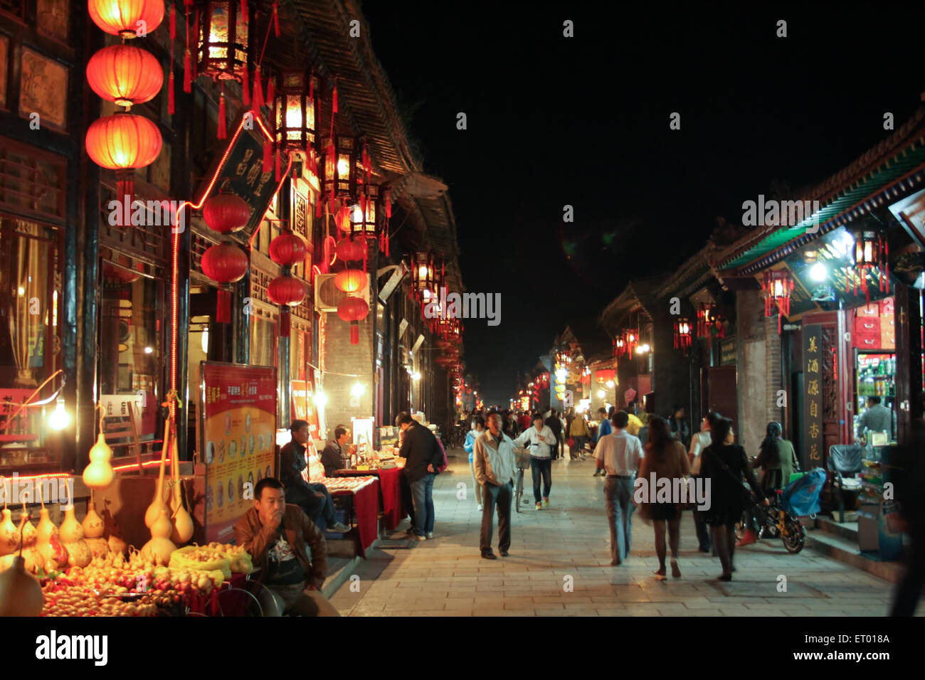 Bright night lights of the ancient Chinese city of Pingyao. China Stock ...