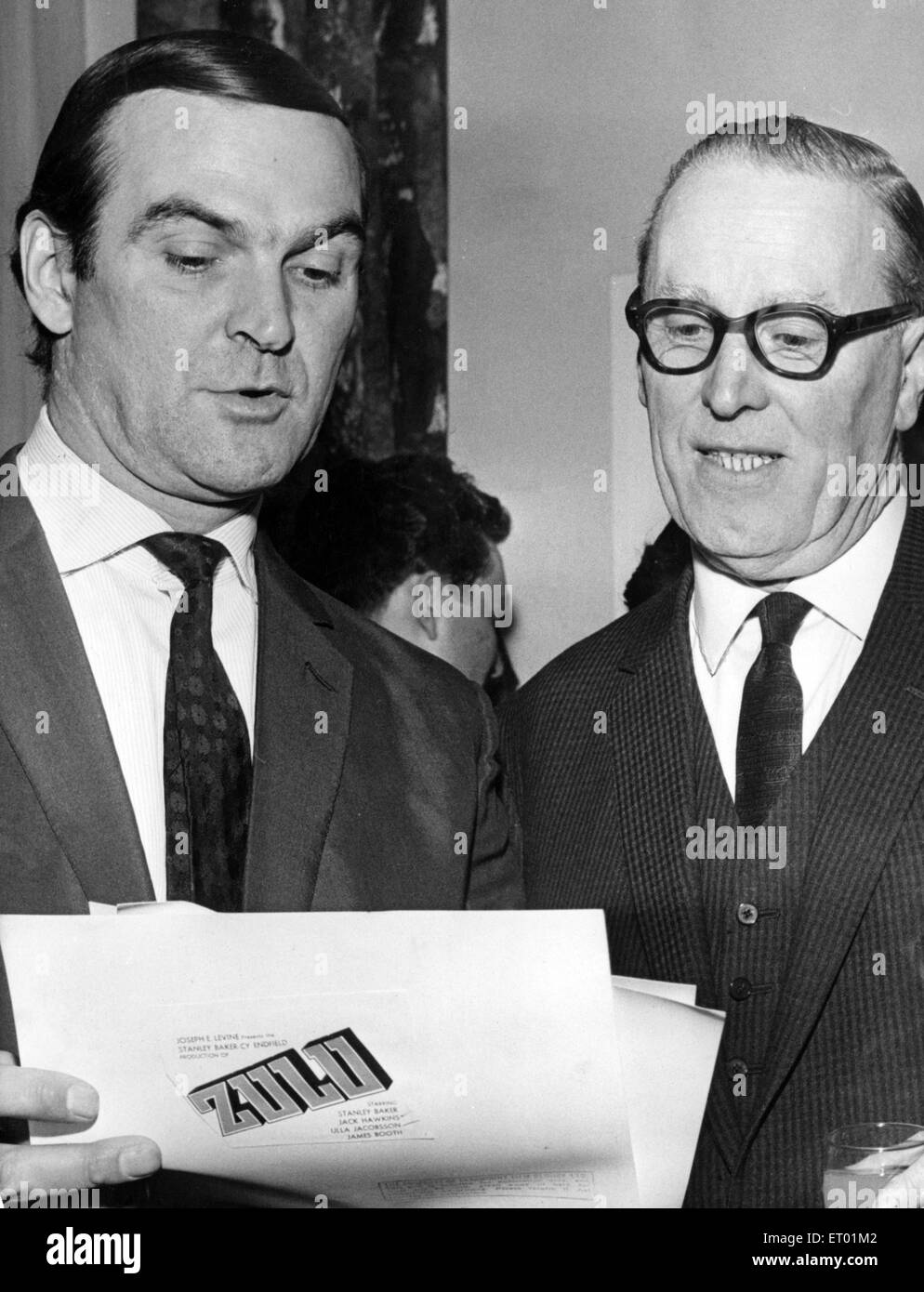 Stanley Baker chats with Mr. Julian Hodge at the reception at the Park ...