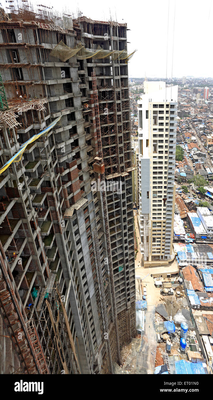 Construction of buildings with old houses in mumbai central ; Bombay ...