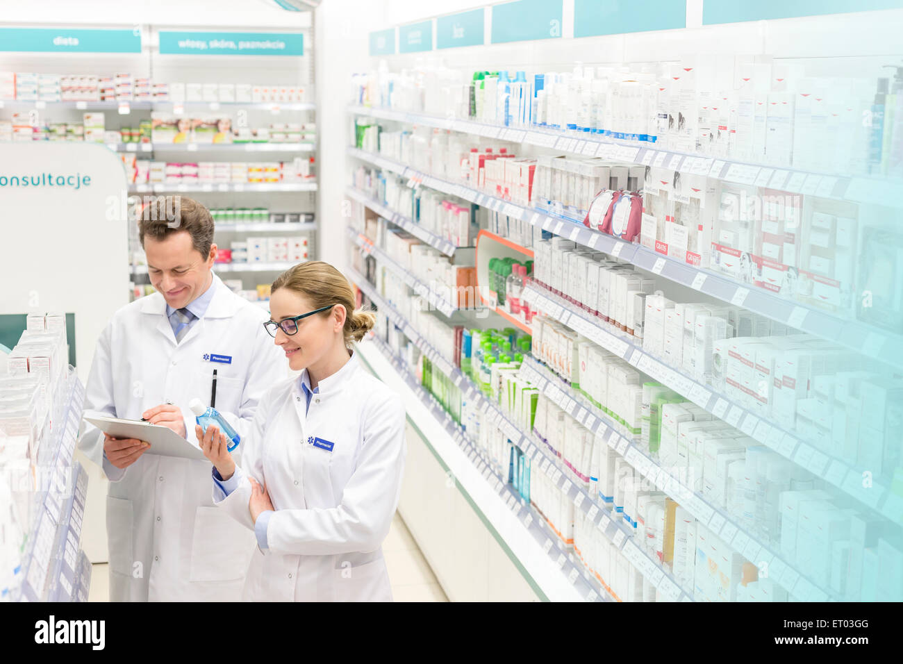 Pharmacists taking inventory in pharmacy Stock Photo - Alamy
