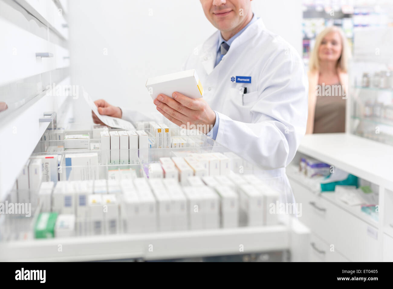 Woman checking prescription medication hi-res stock photography and ...