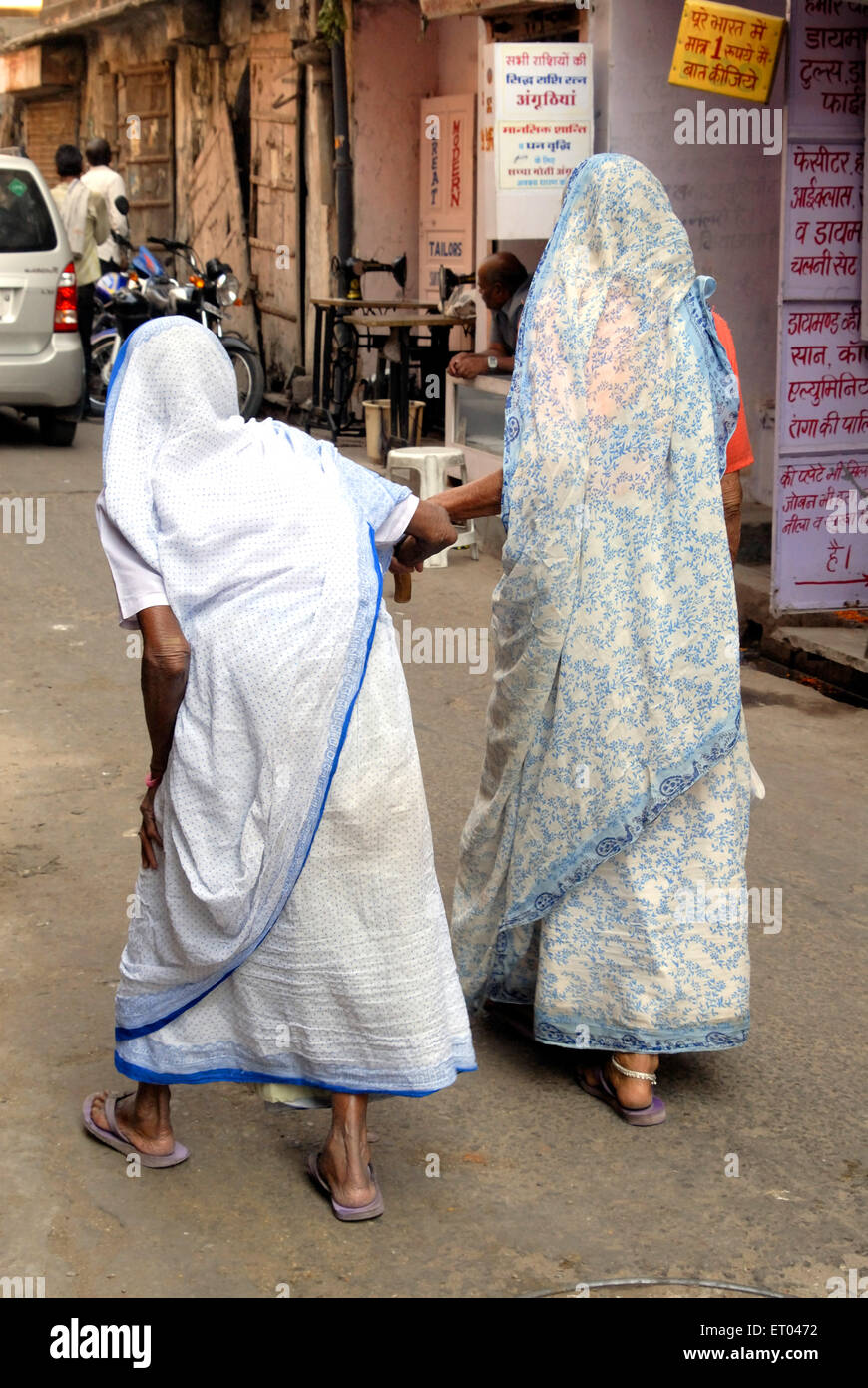 Woman helping old lady ; Jaipur ; Rajasthan ; India , asia Stock Photo ...