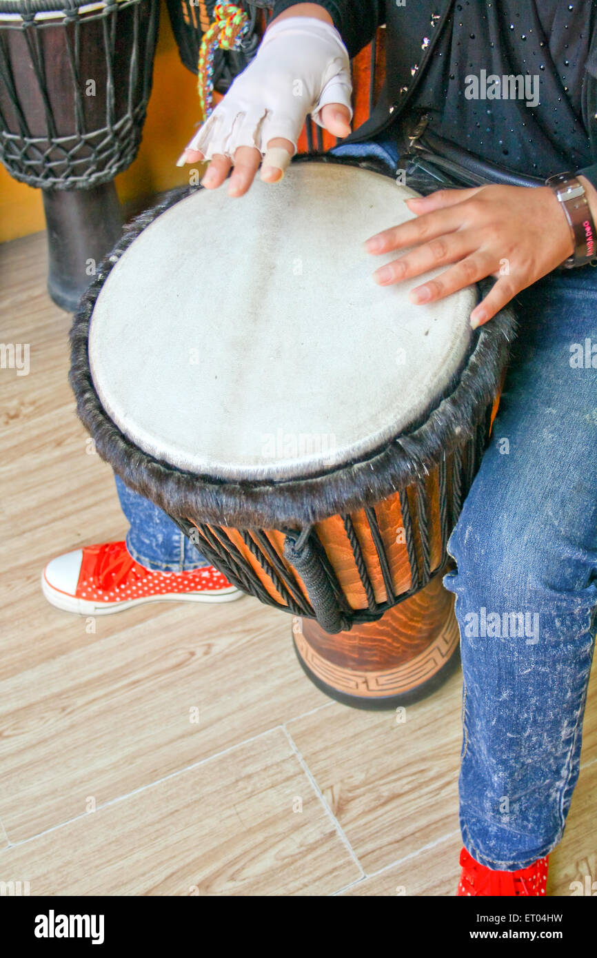 musician's hands when playing a percussion instrument Stock Photo - Alamy