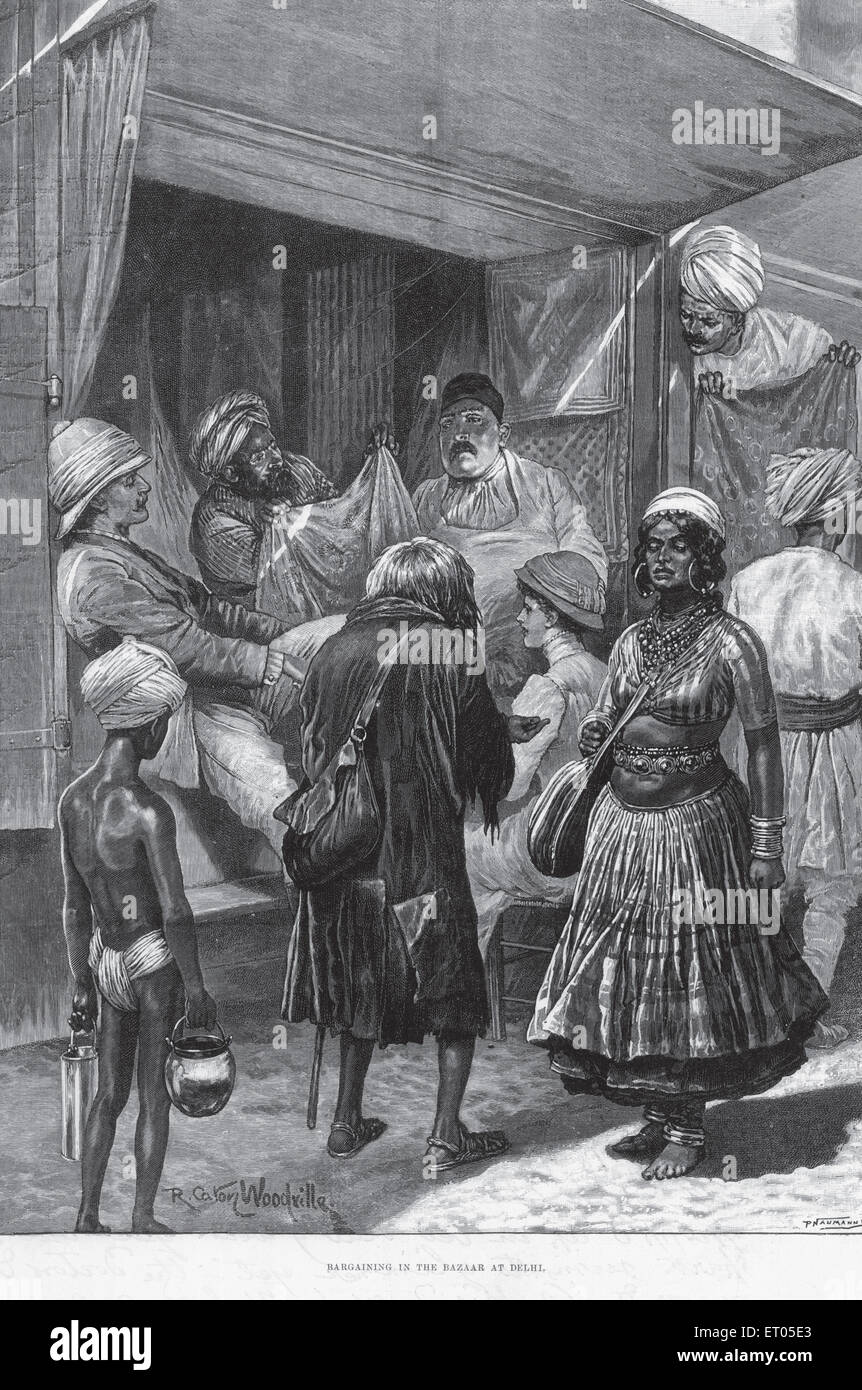 Bargaining in the bazaar at Delhi ; India Stock Photo - Alamy