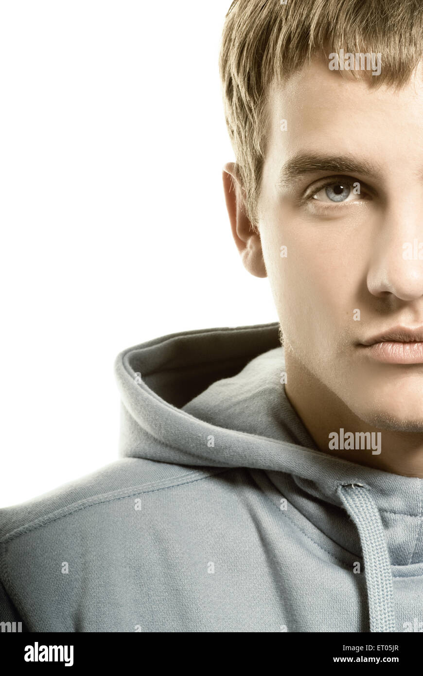 Sad young man over white background Stock Photo - Alamy