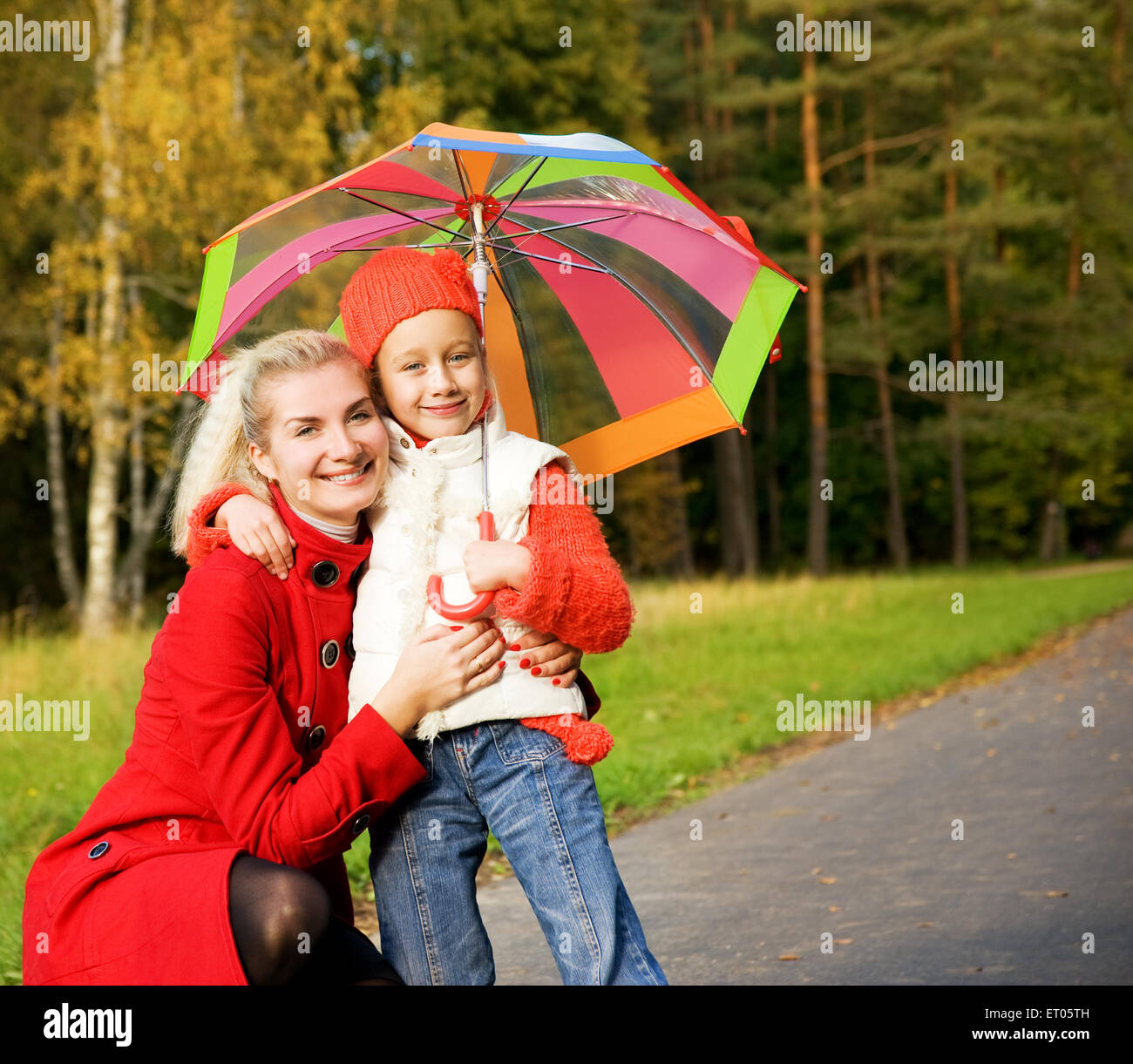Mother and daughter in autumn forest Stock Photo - Alamy
