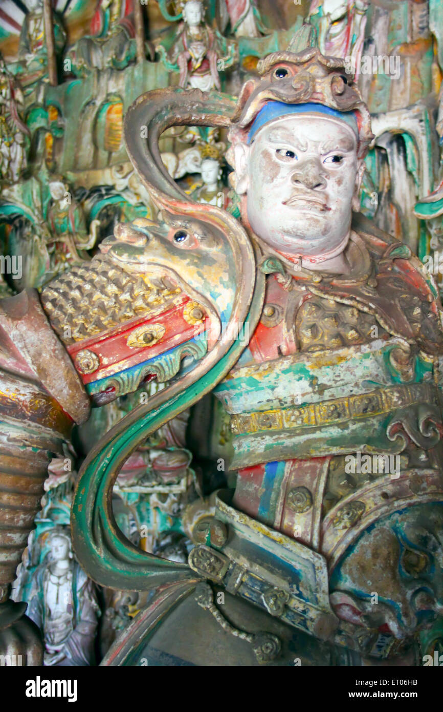 Buddha - a warrior in ancient temple in central China Stock Photo - Alamy