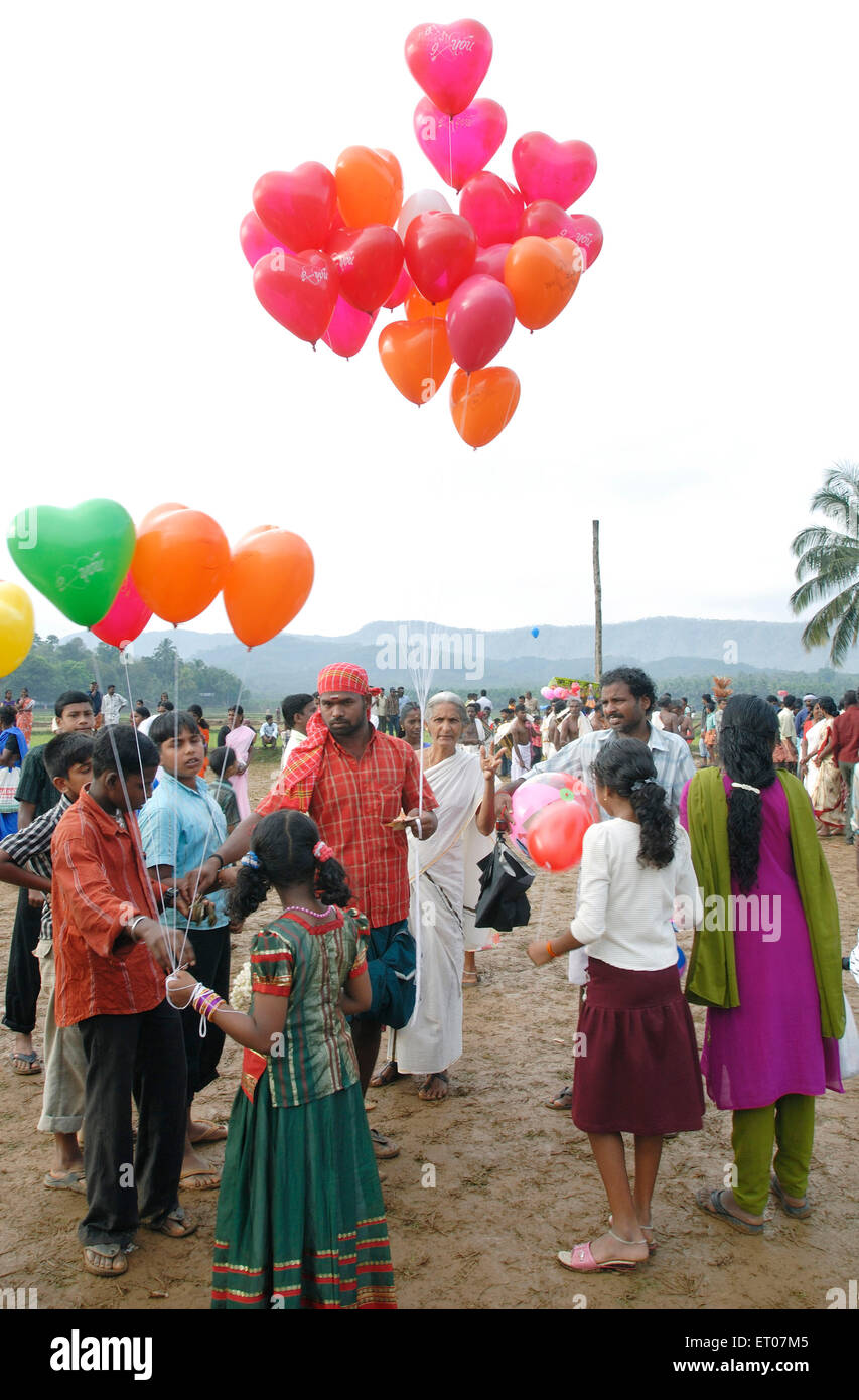 People holding balloons and celebrating festival ; kerala ; India Stock ...