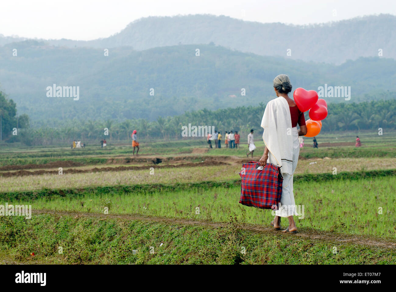 woman carrying heart shape balloons, kerala, India, asia Stock Photo ...