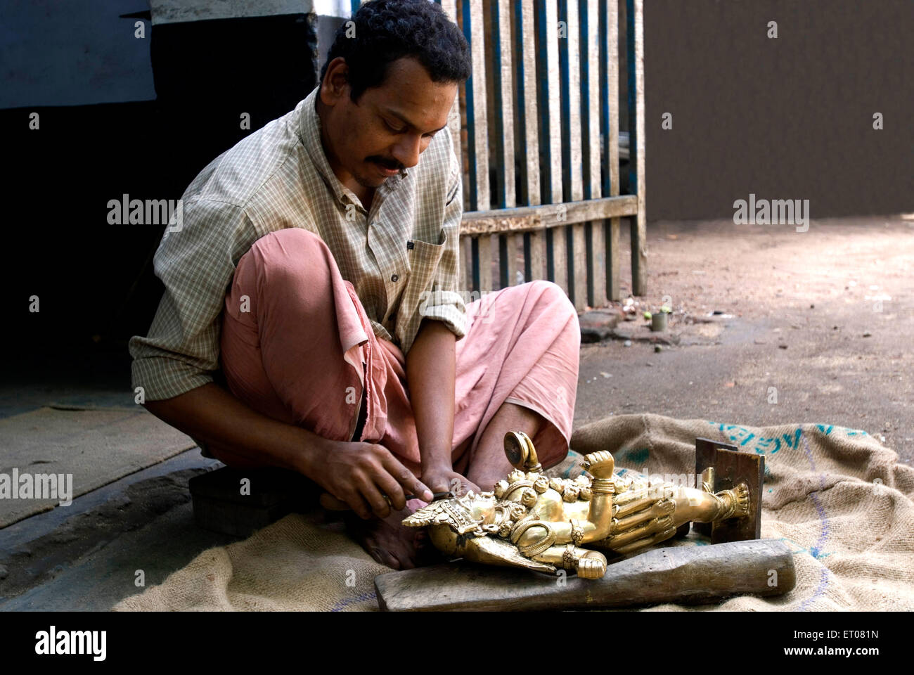 Man making bronze sculpture ; Irinjalakuda ; Kerala ; India NO MR Stock ...
