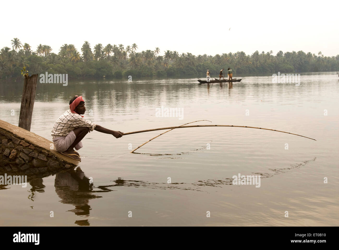Fishing on backwaters of Cherai ; Kerala ; India Stock Photo - Alamy