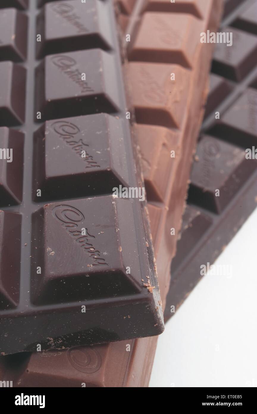 Three slabs of chocolate Stock Photo - Alamy