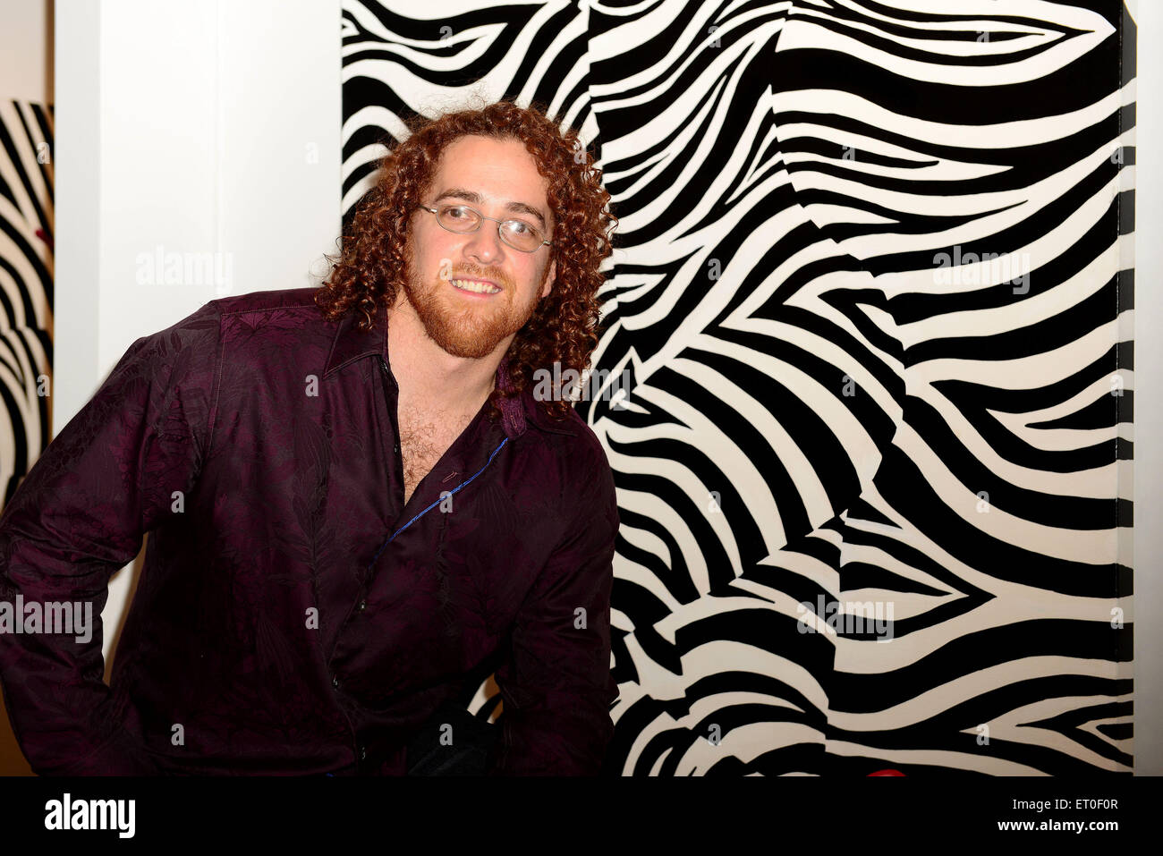 Blake Emory pictured with his works during his highly anticipated ...