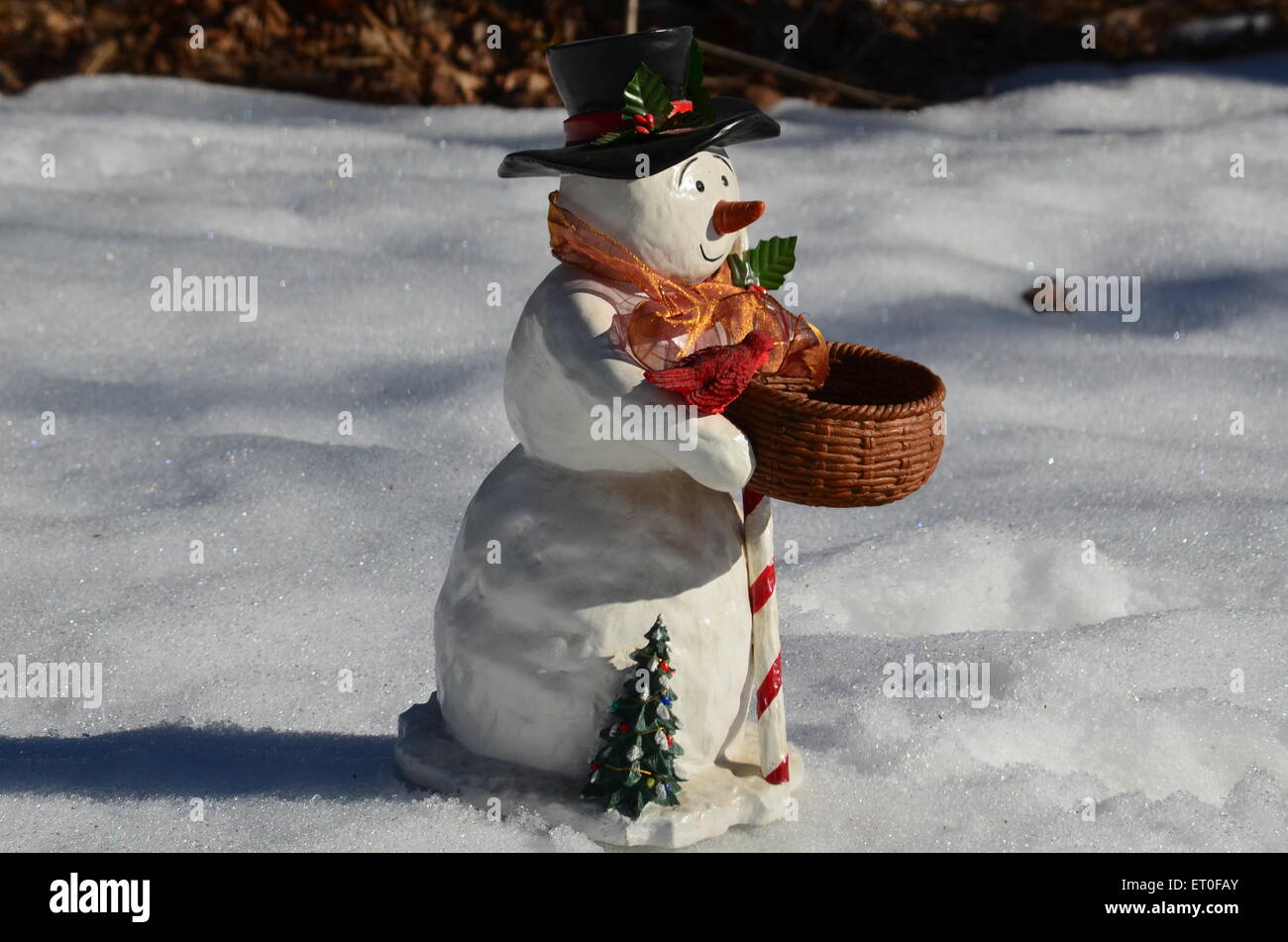 Snowman in the snow Stock Photo - Alamy