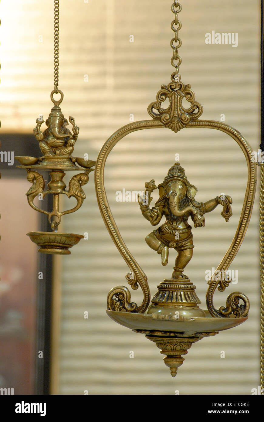 Heritage brass lamps with dancing pose of Lord Ganesh ; India Stock ...