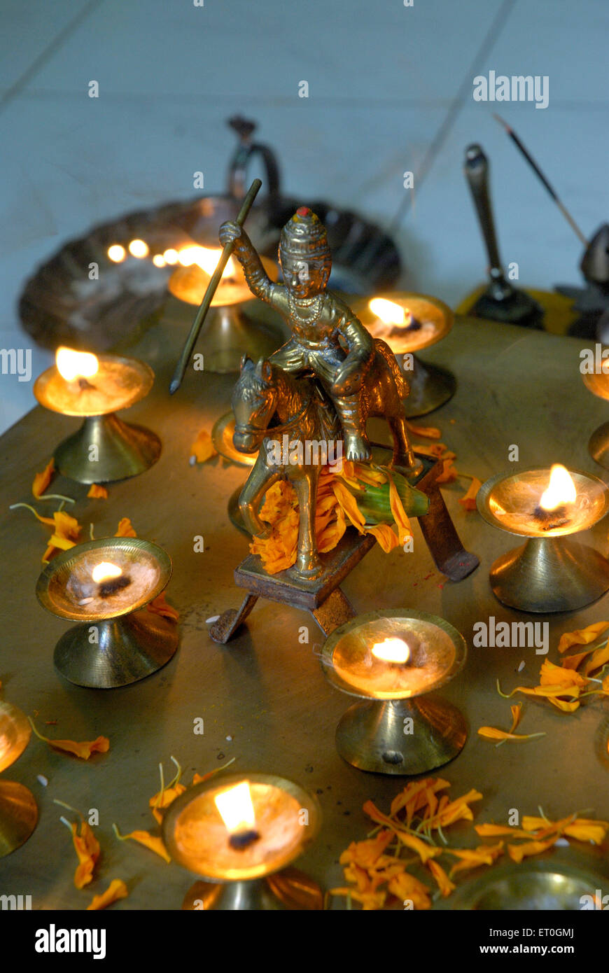 Deep puja on balipratipada with bali raja statue on horse with weapon ...