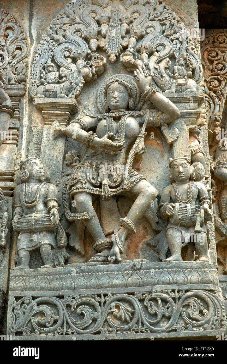 Figure of female in dancing pose at Shiva temple ; Halebidu Stock Photo ...