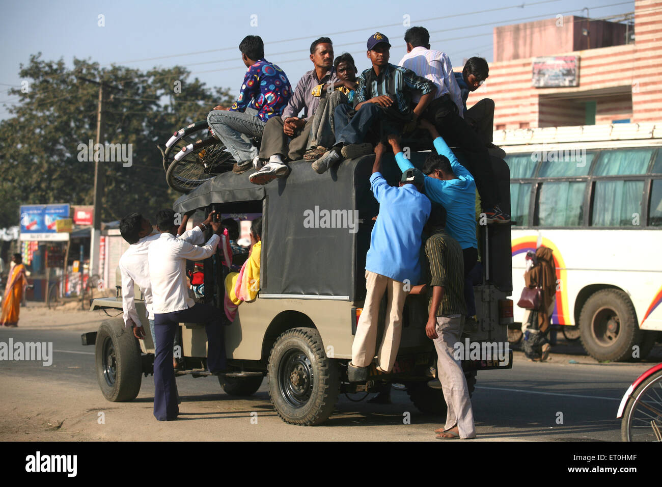 Passengers sitting on top of jeep used local transport system in ...