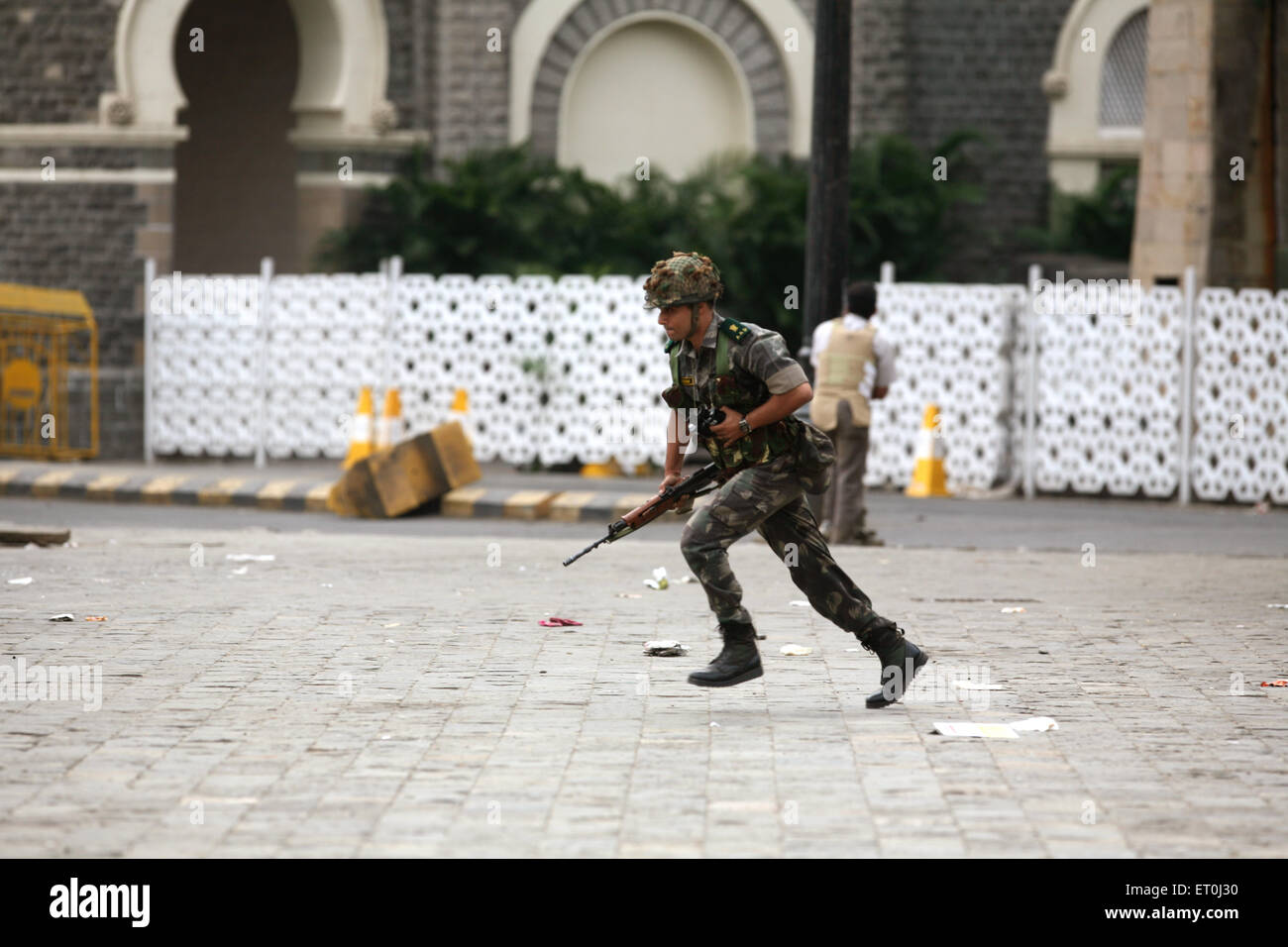 Man gun running hi-res stock photography and images - Alamy