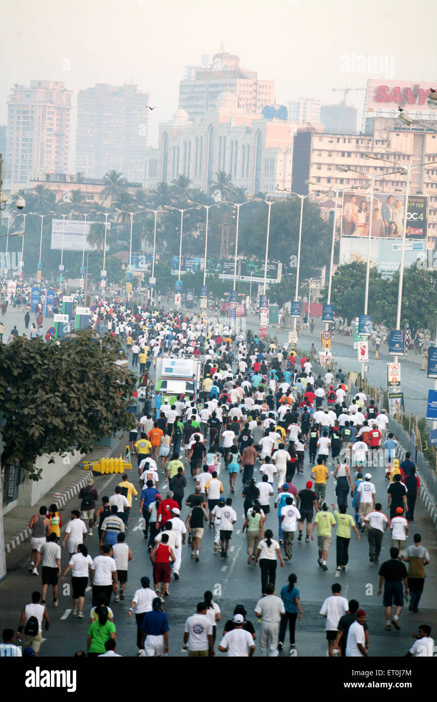 Participants running during the Mumbai marathon organized in Bombay now ...