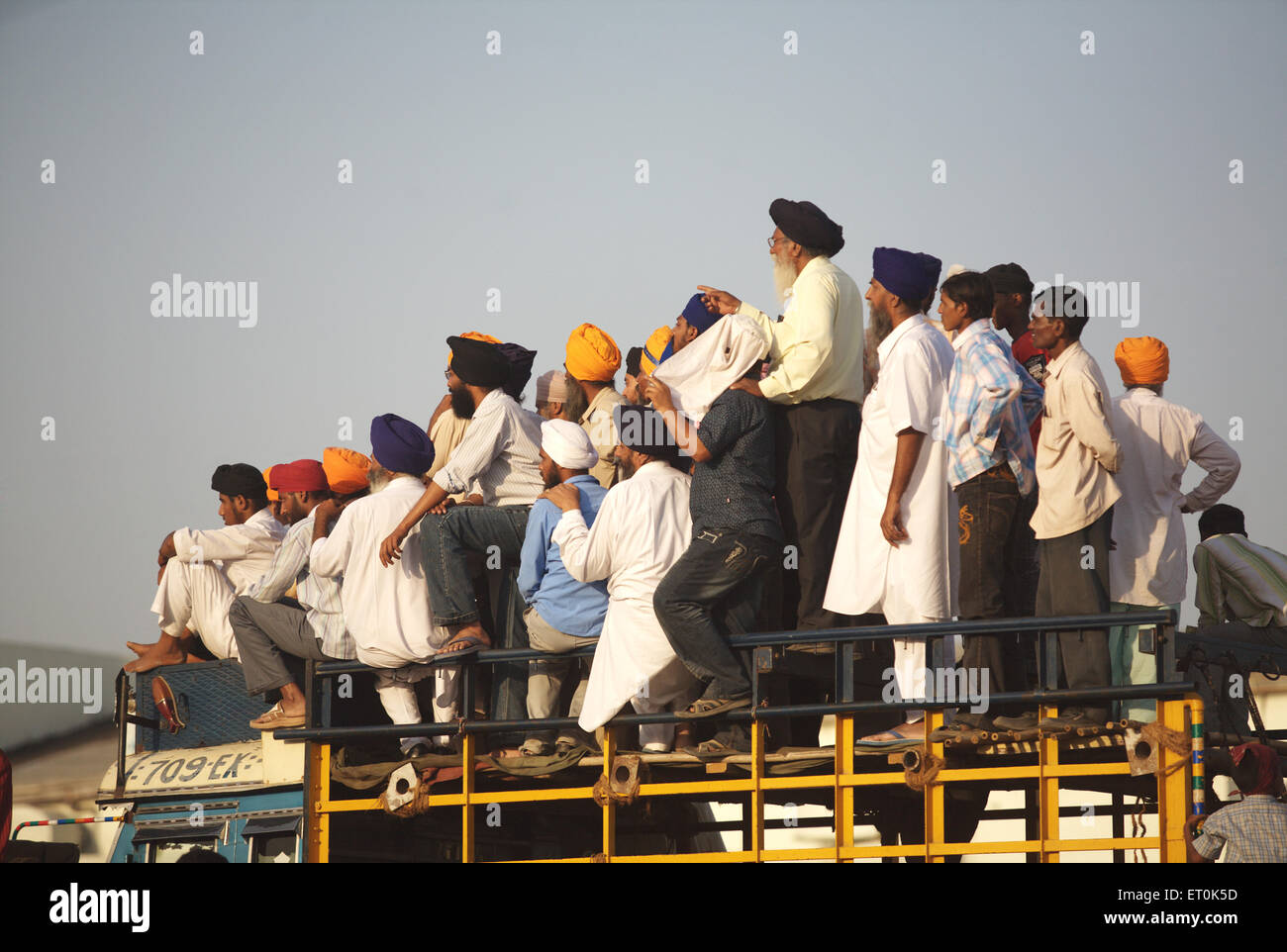 Sikh devotees standing truck watching stunts Nihangs Sikh warrior ...