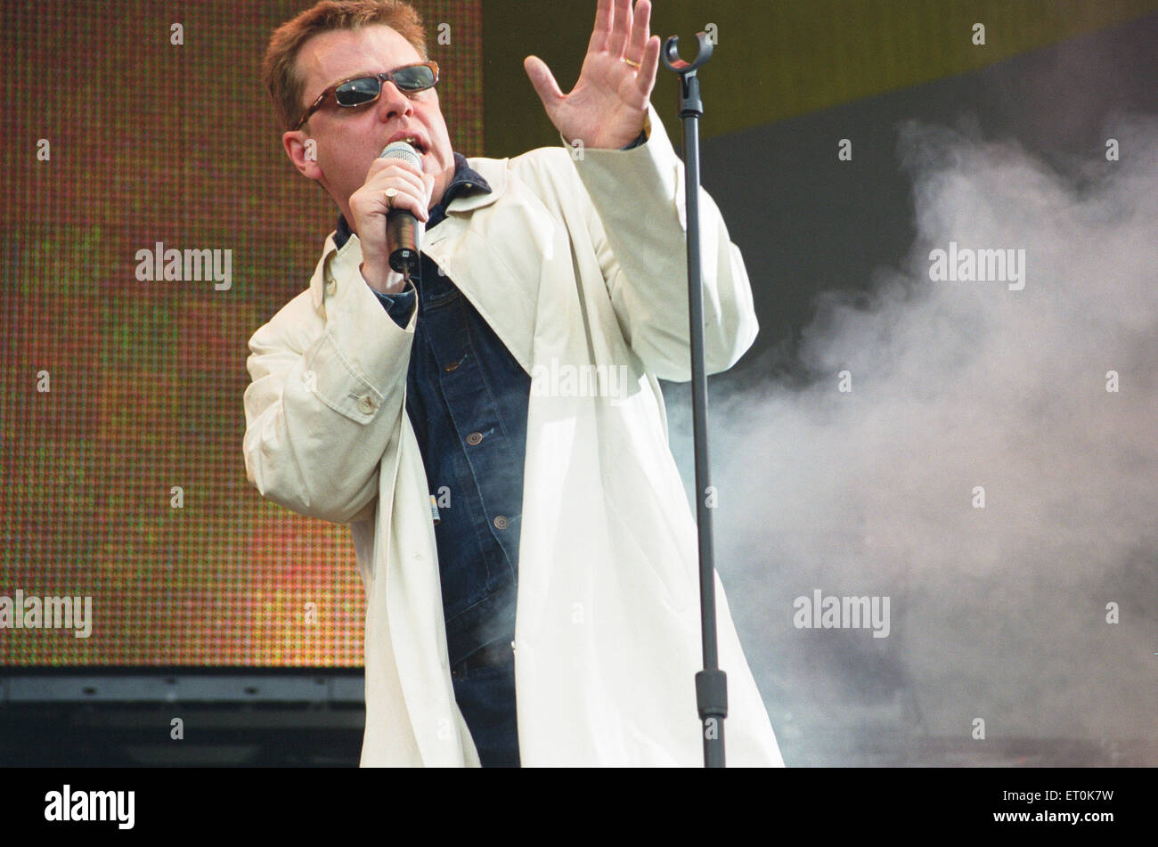 Suggs, lead singer of British ska group Madness, performing at Party in ...