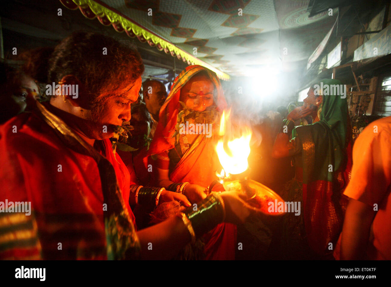 Eunuch followers praying before goddess Yellama ; wedding of eunuchs on ...