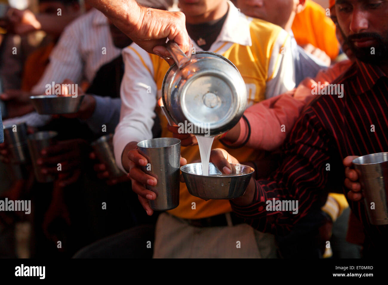 Karsevak distributing bhang or thandai to devotees during the ...