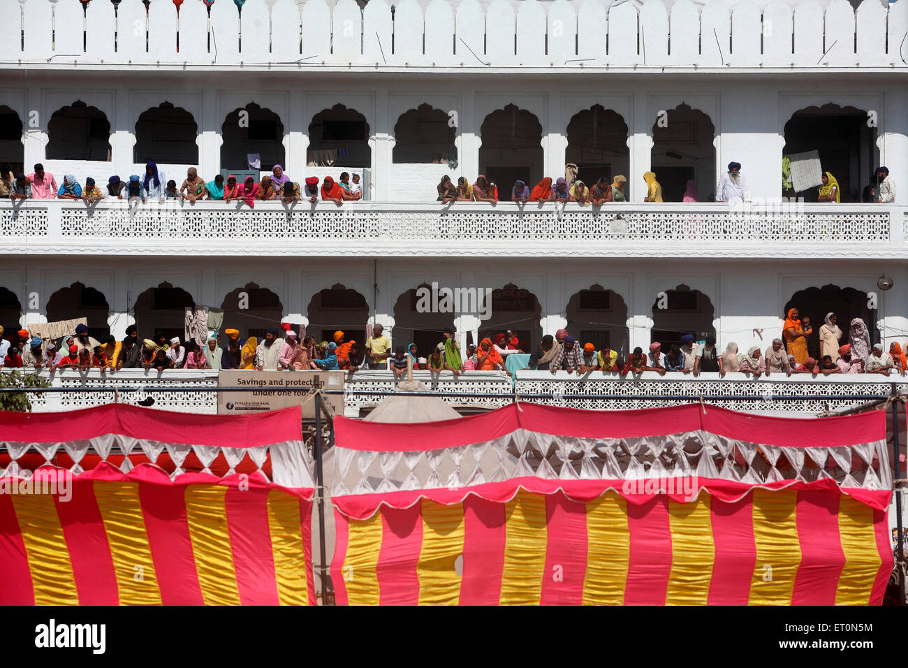Devotees watching procession of Hola Mohalla festival from Anandpur ...