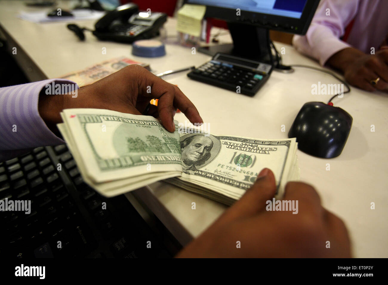 Bank handling counting US dollars Stock Photo - Alamy