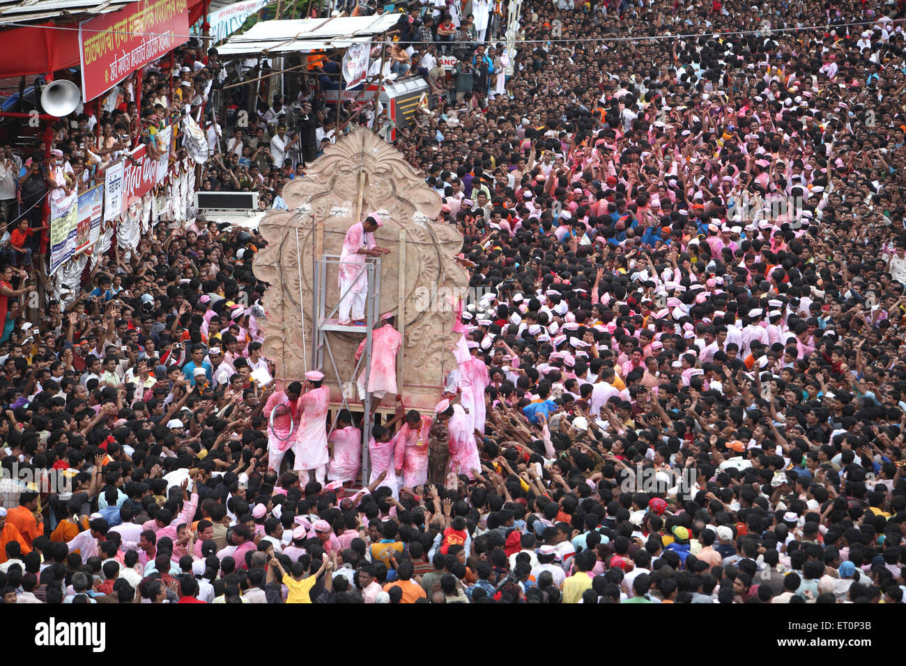 Devotees watching ganesh immersion of lalbaugcha raja in Bombay Mumbai ...