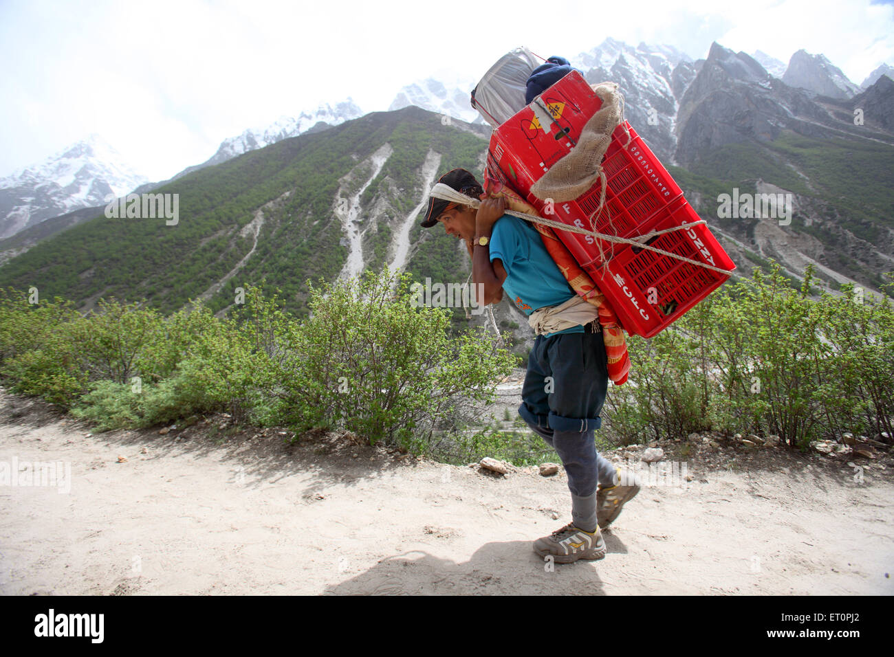 Indian man porter carrying hi-res stock photography and images - Alamy