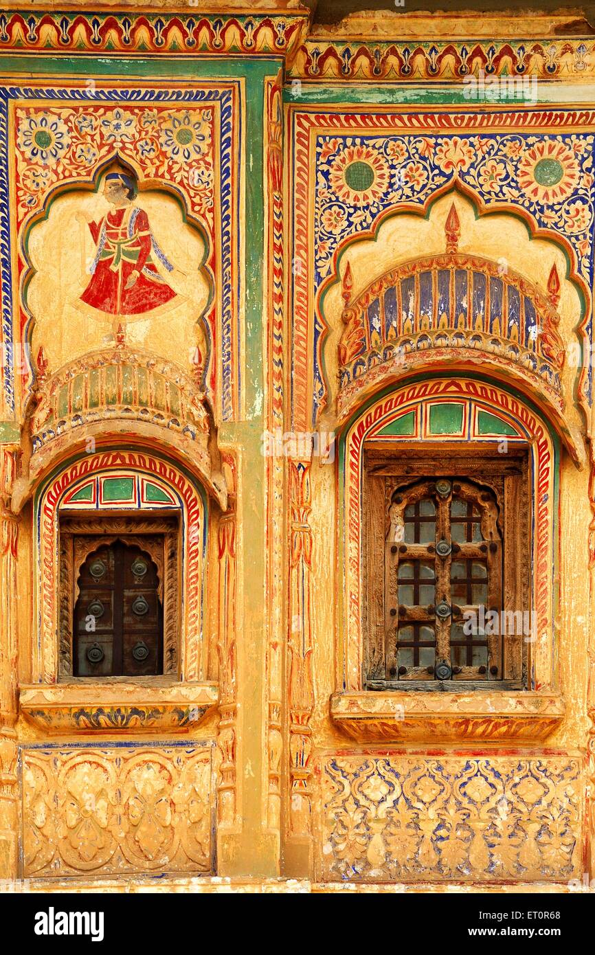 Windows and painting of haveli ; Fatehpur Shekhavati ; Rajasthan ...