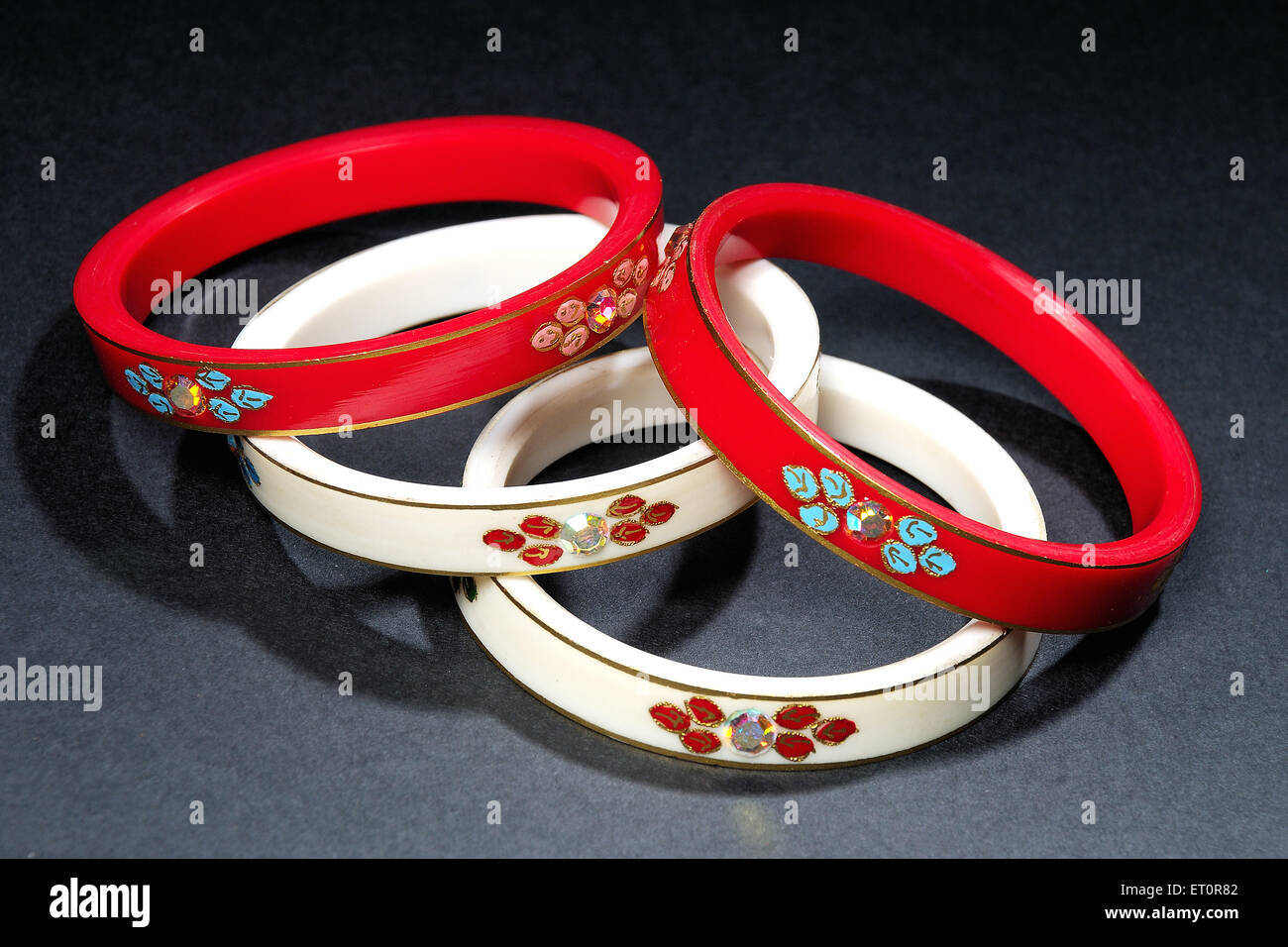 Lac bangles studded with diamonds Stock Photo - Alamy