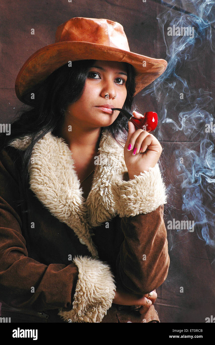 Women smoking pipe hi-res stock photography and images - Alamy