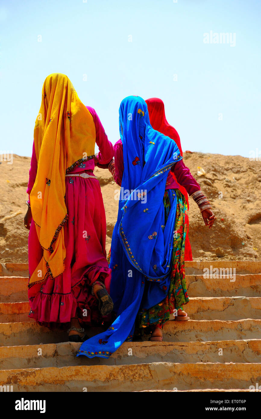 Three women colorful dress, Ramdevra temple, Pokhran, Jaisalmer ...