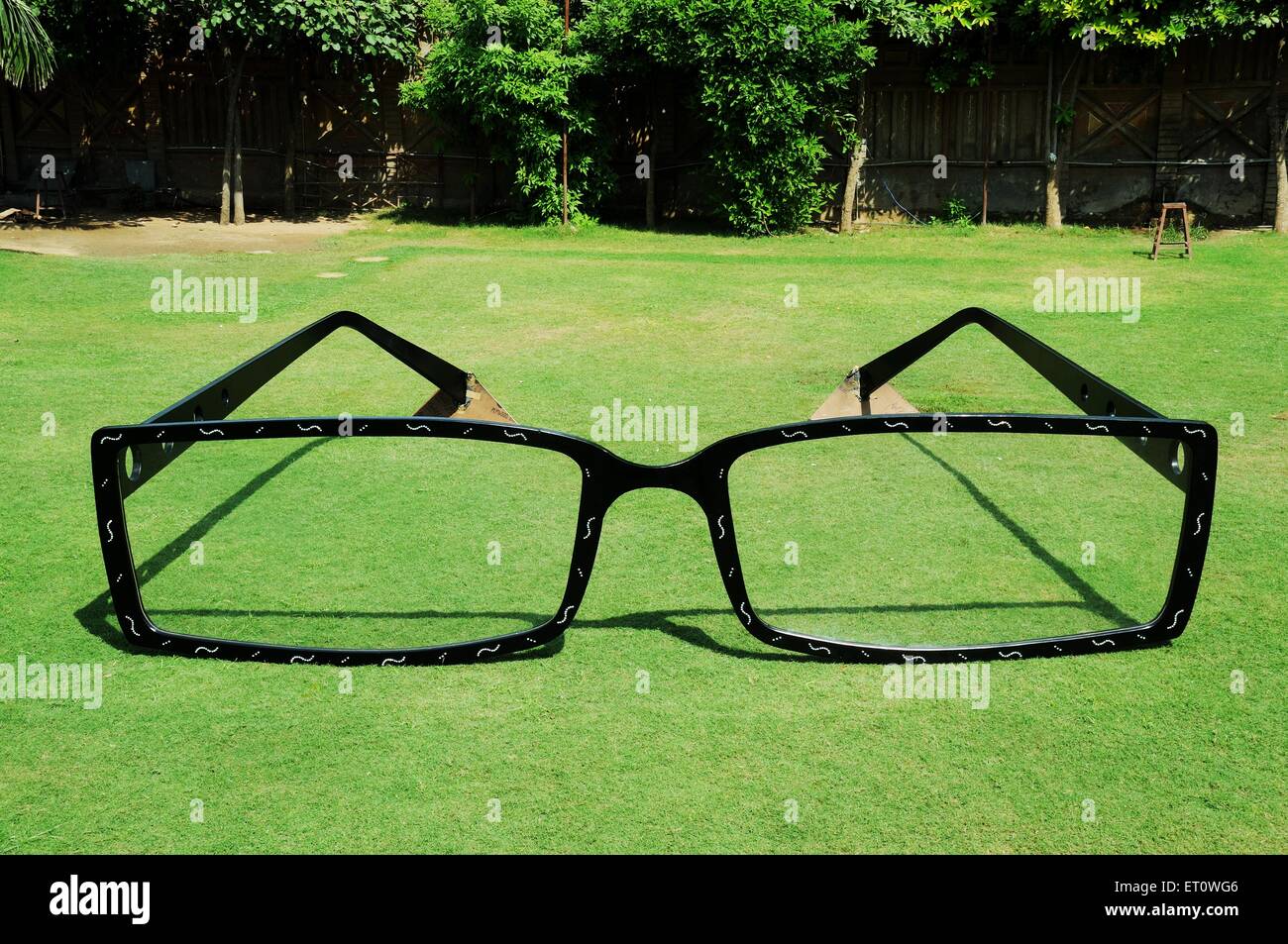 toy spectacle frame in garden Stock Photo - Alamy