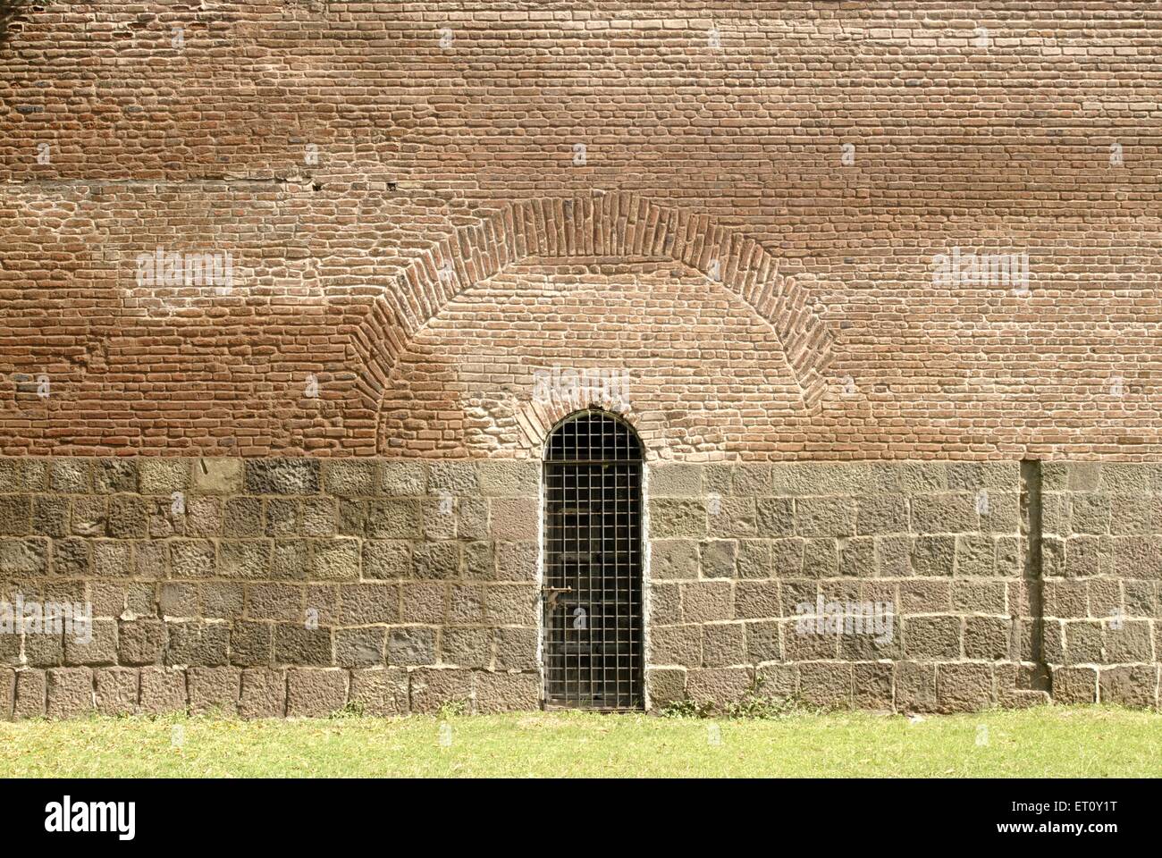 Fortification by coursed rubble masonry and brickwork wall of ...