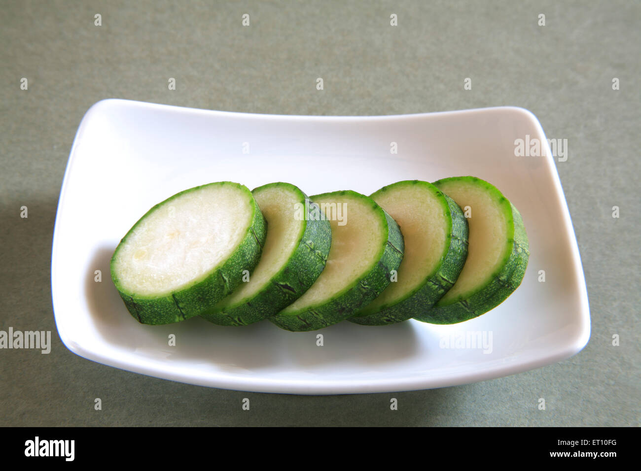 Green vegetable ; round slices of ghiya nanuan creeper pompion kind of ...