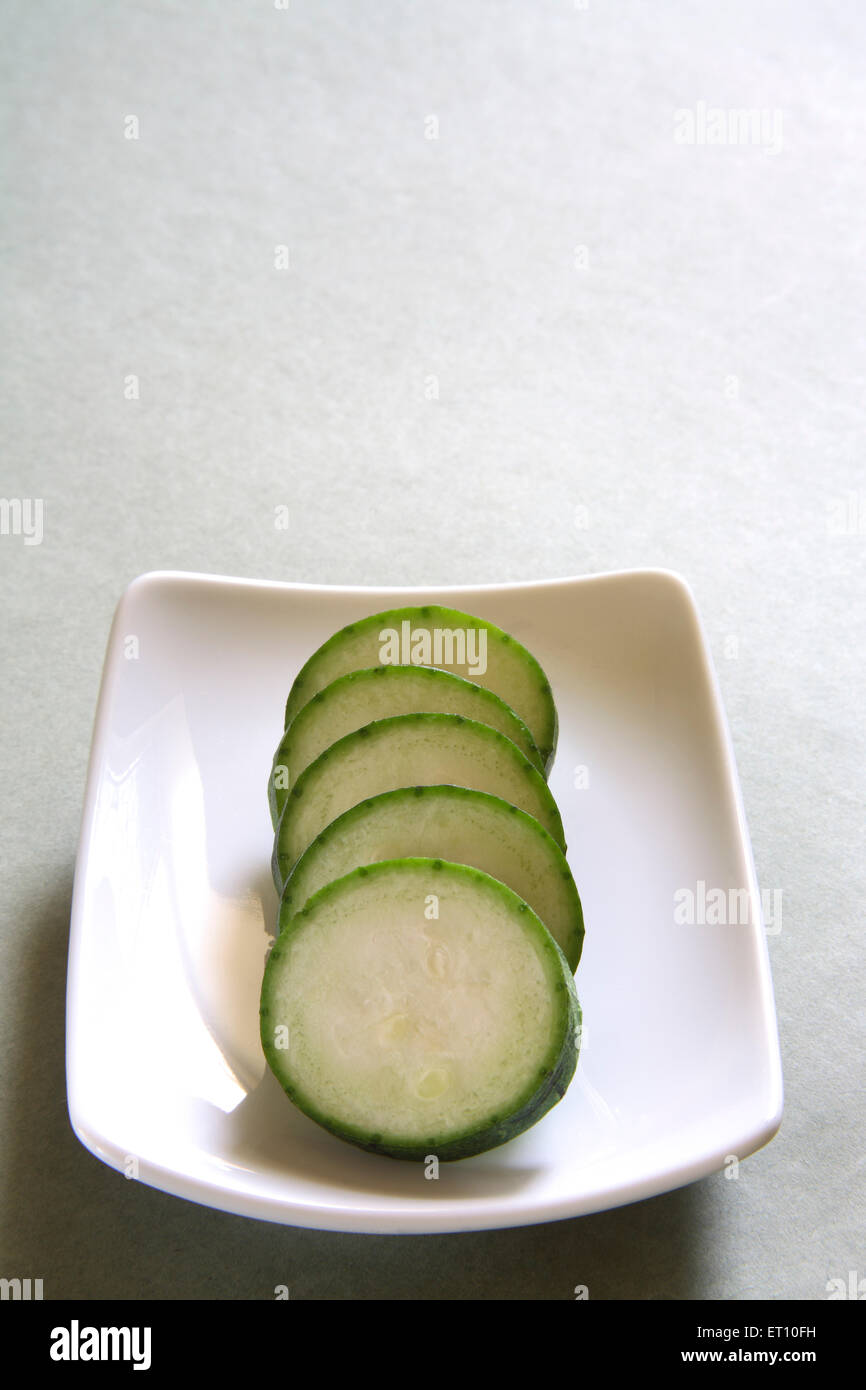 Green vegetable ; round slices of ghiya nanuan creeper pompion kind of ...