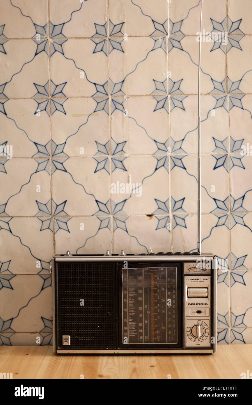 Vintage Radio with old-fashioned patterned tiles in the background ...