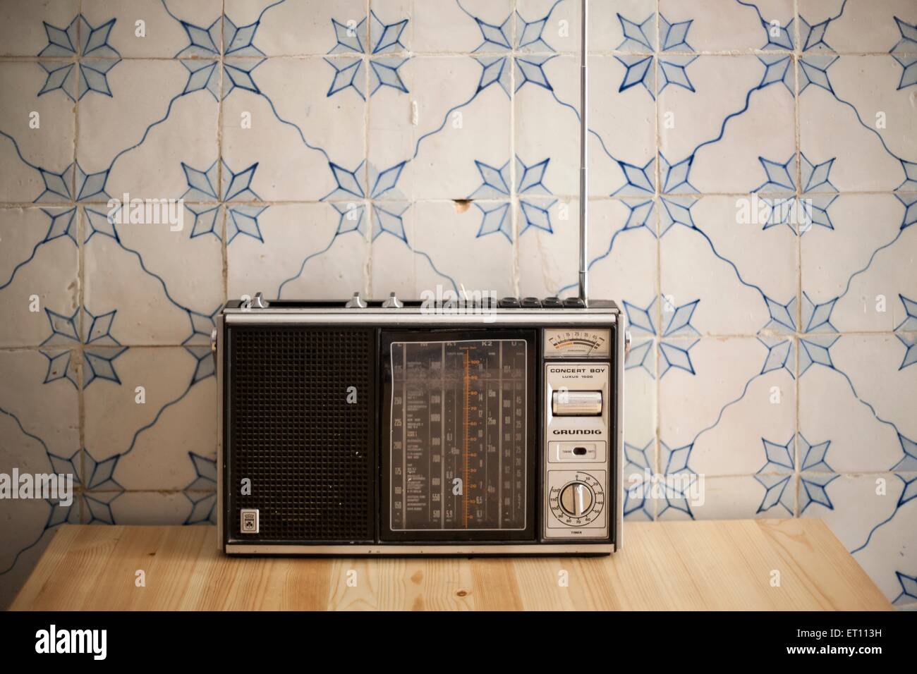 Vintage Radio with old-fashioned patterned tiles in the background ...