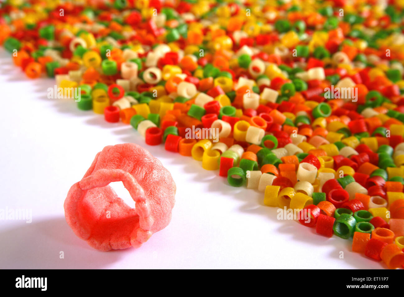 Colourful raw and fried round chips on white background Stock Photo - Alamy