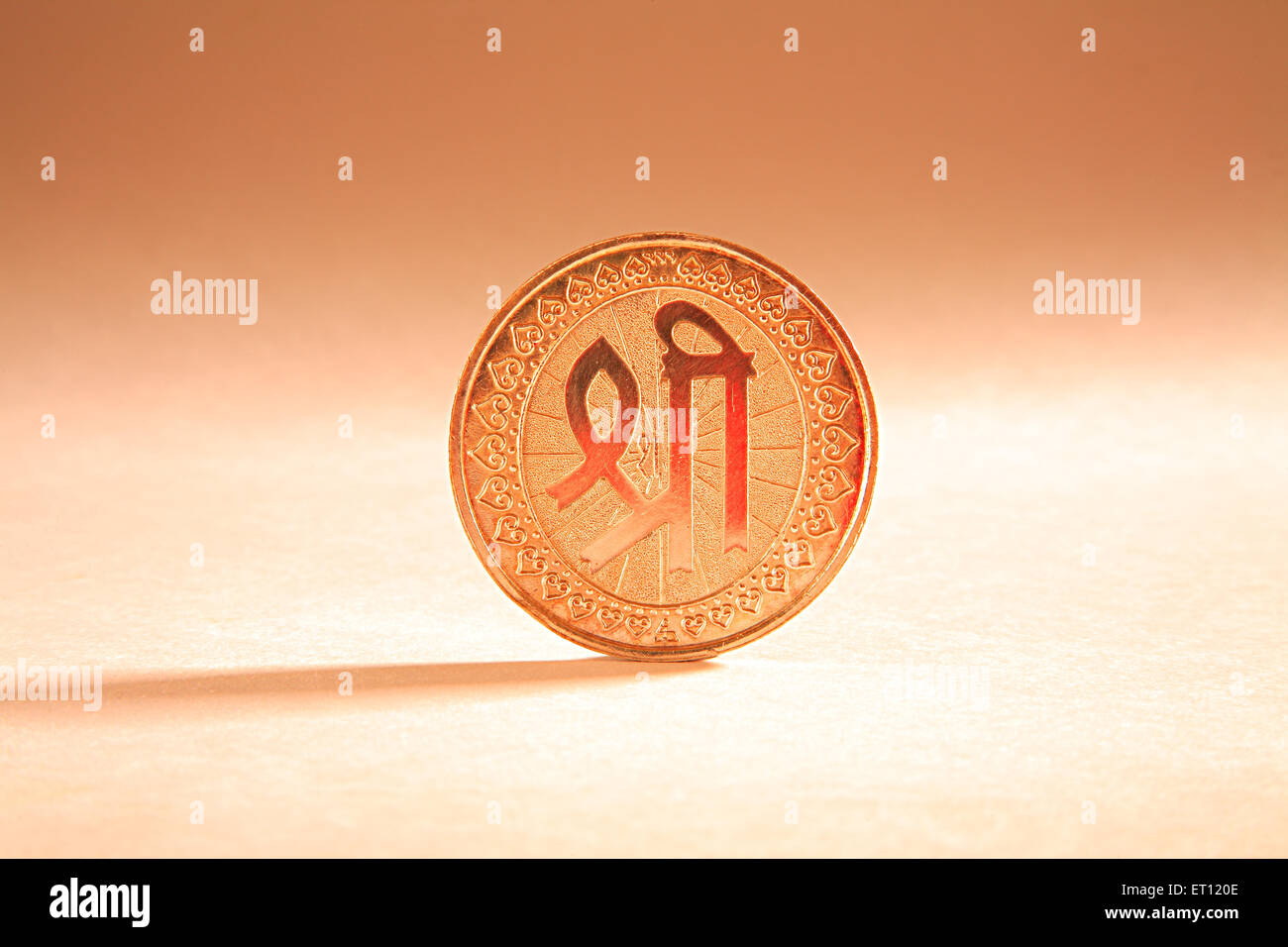 Gold coin with auspicious Shri , Shree , Sri , Sree , symbol , India ...