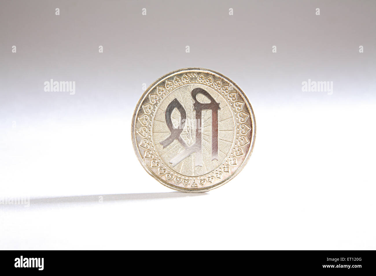 Silver coin with auspicious Shri , Shree , Sri , Sree , symbol , India ...