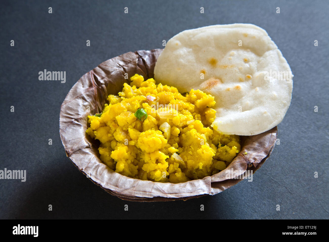 Food ; jhunka bhakar in bowl on black background 2 March 2010 Stock ...