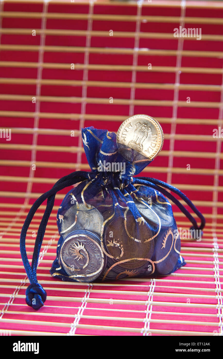 potli bag, batua pouch, batua bag, batua purse, red background Stock ...