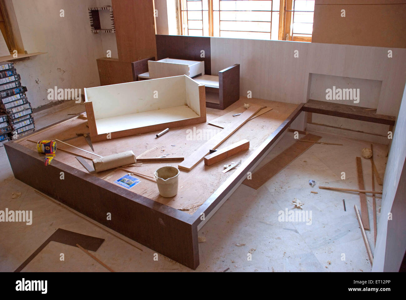 Incomplete carpentry work making bed Stock Photo - Alamy